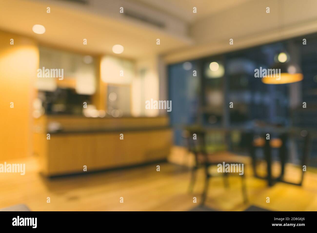 Blurred Luxurious Wooden And Clean Modern Kitchen With Glass Counter ...