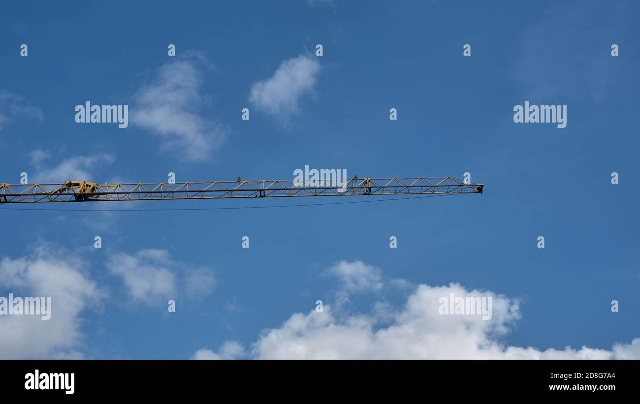 Long arm boom in deep blue sky background Stock Photo - Alamy