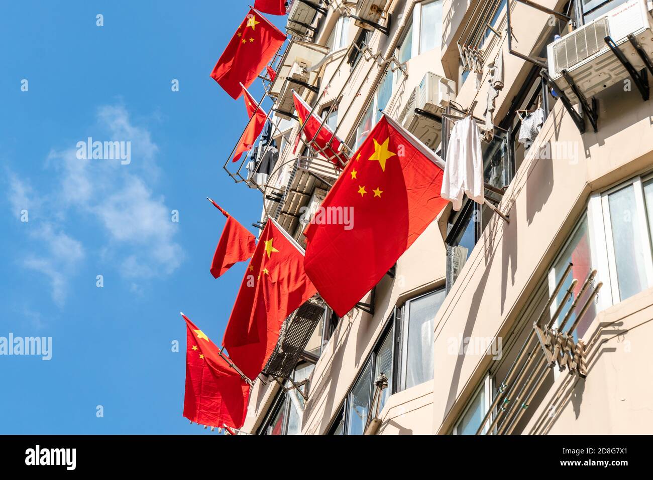 National flags are set up at residential aeras at Fuzhou Road in ...