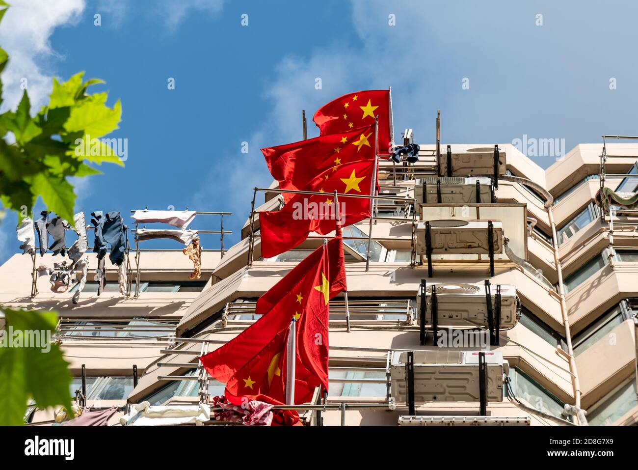 National flags are set up at residential aeras at Fuzhou Road in ...
