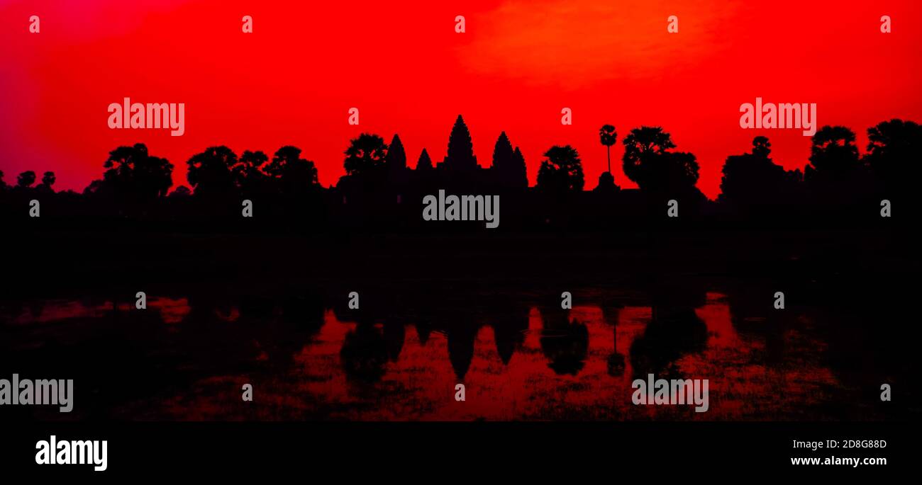 Banner Angkor Wat facade silhouette reflection on water pond on ...