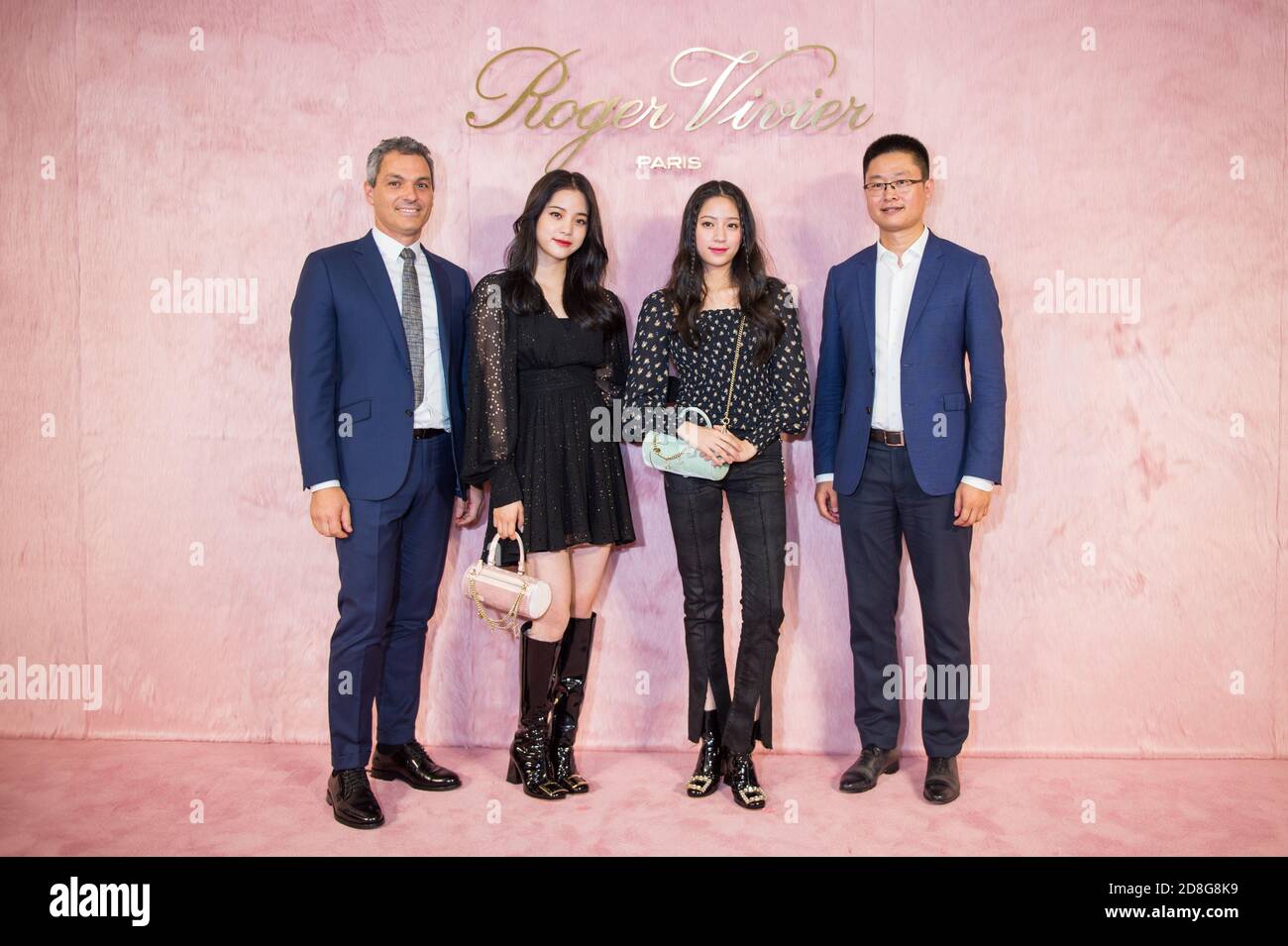 Chinese musician, actress Ouyang Nana and her sister Ouyang Didi stand for French shoes brand ...