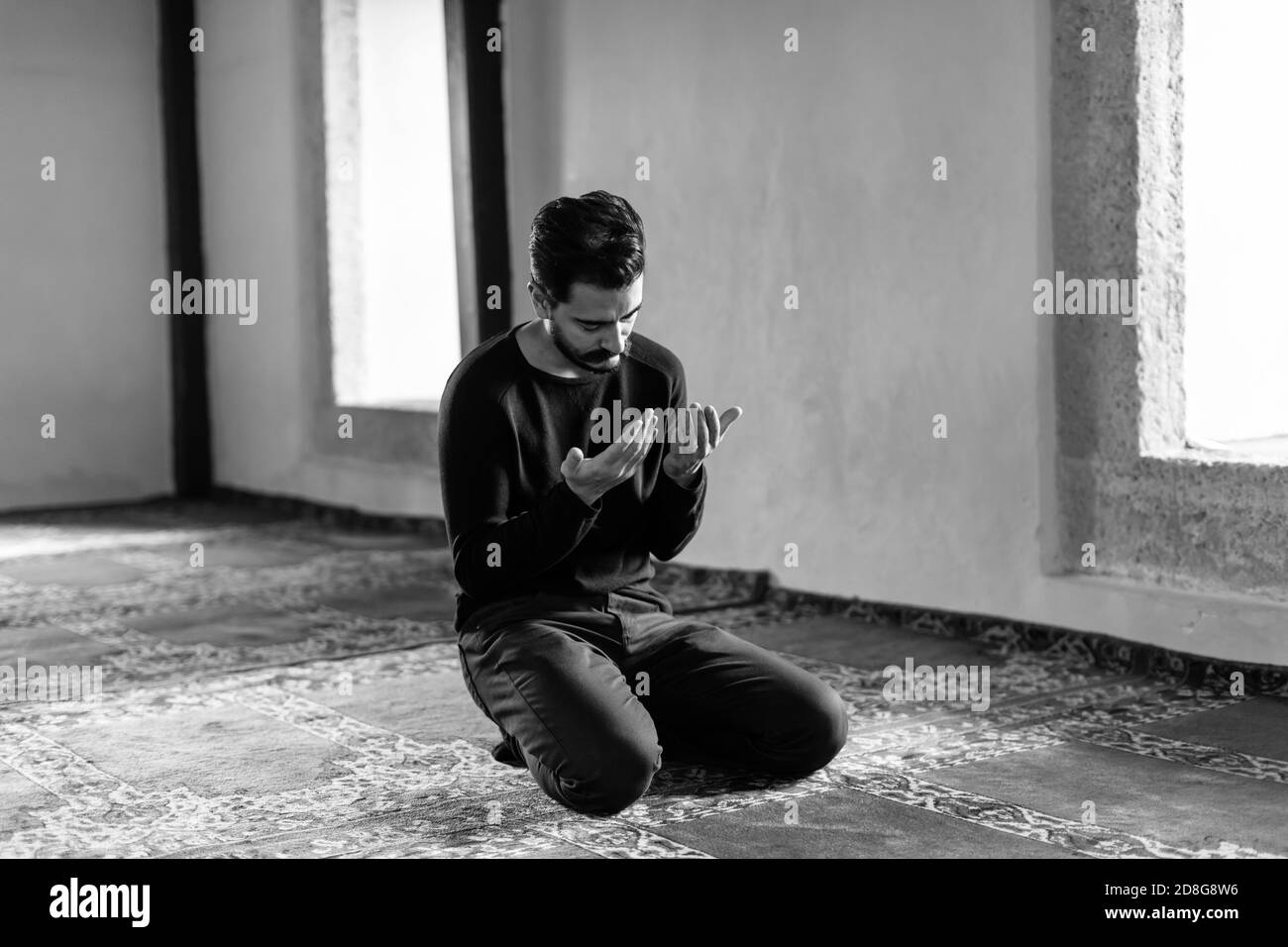 Young Mustached Man Praying In Mosque Stock Photo - Alamy