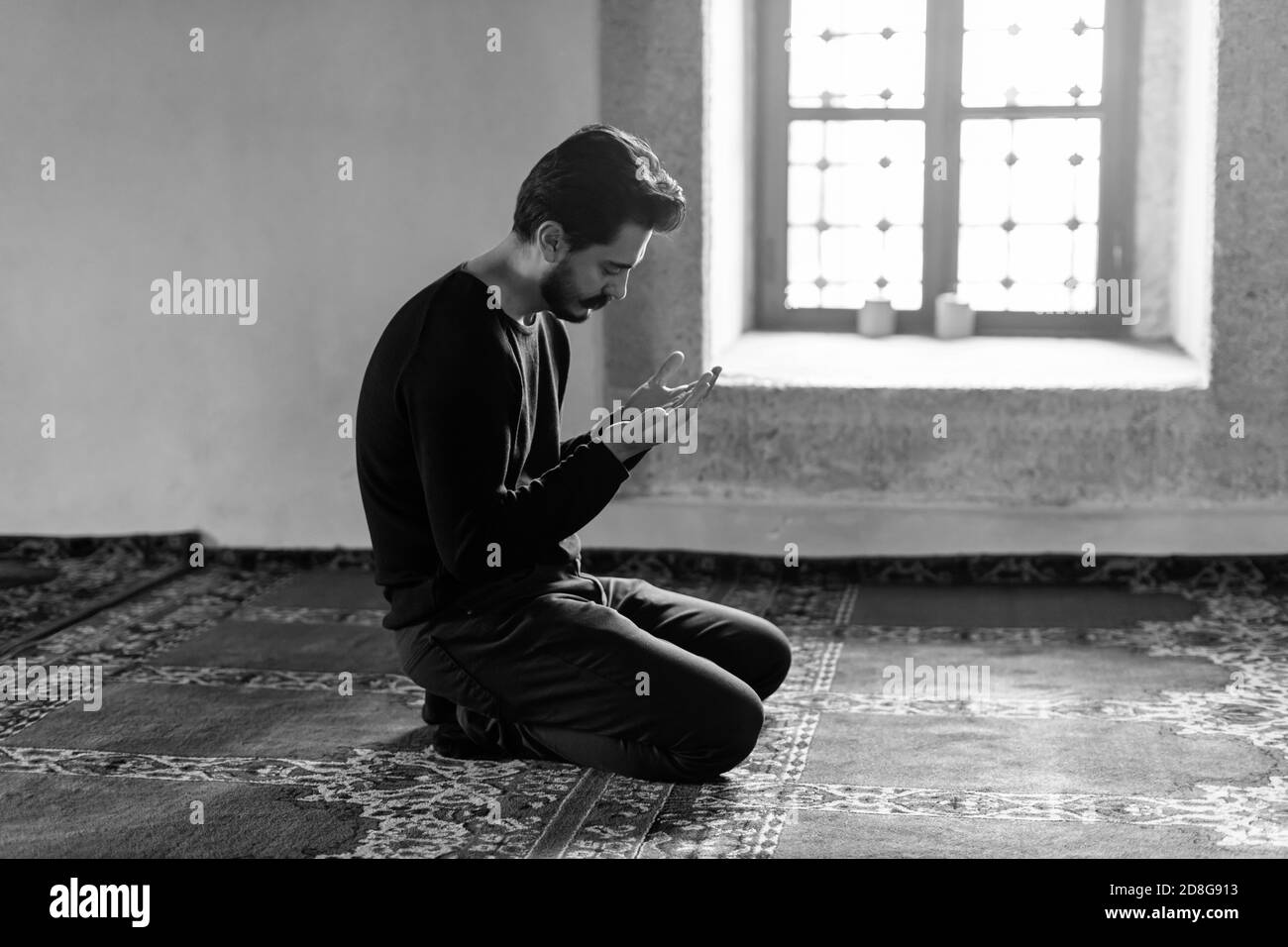 Young Mustached Man Praying In Mosque Stock Photo - Alamy