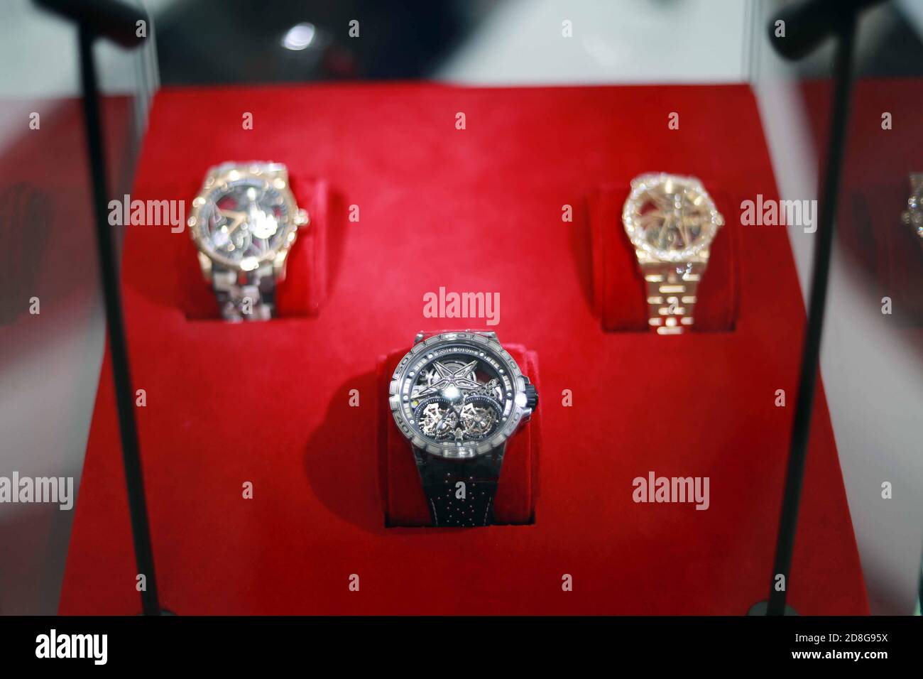 Visitors take a tour during the Watches & Wonders exhibition, which ...