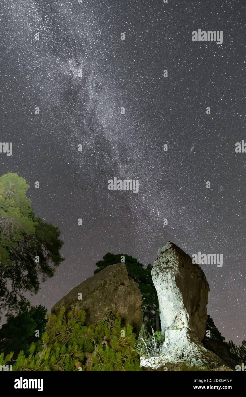 Large boulder illuminated under the milky way Stock Photo - Alamy