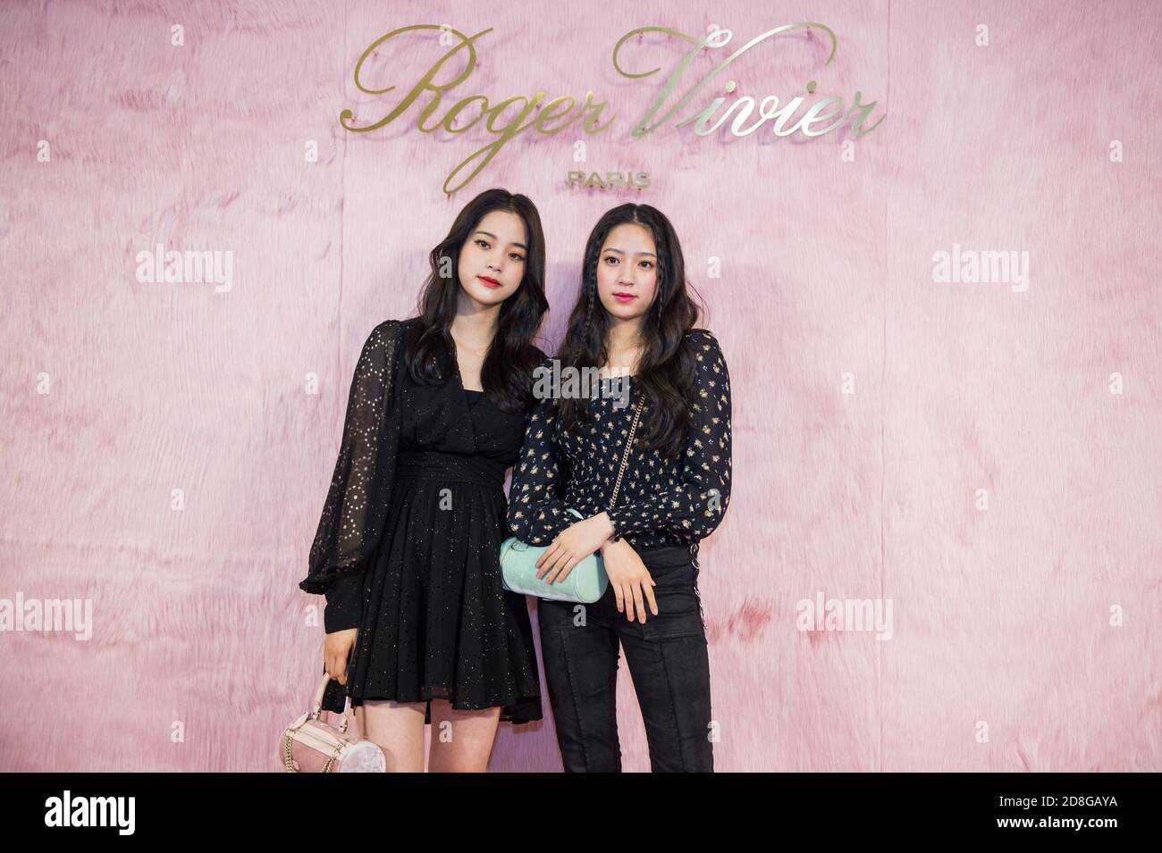 Chinese musician, actress Ouyang Nana and her sister Ouyang Didi stand for French shoes brand ...