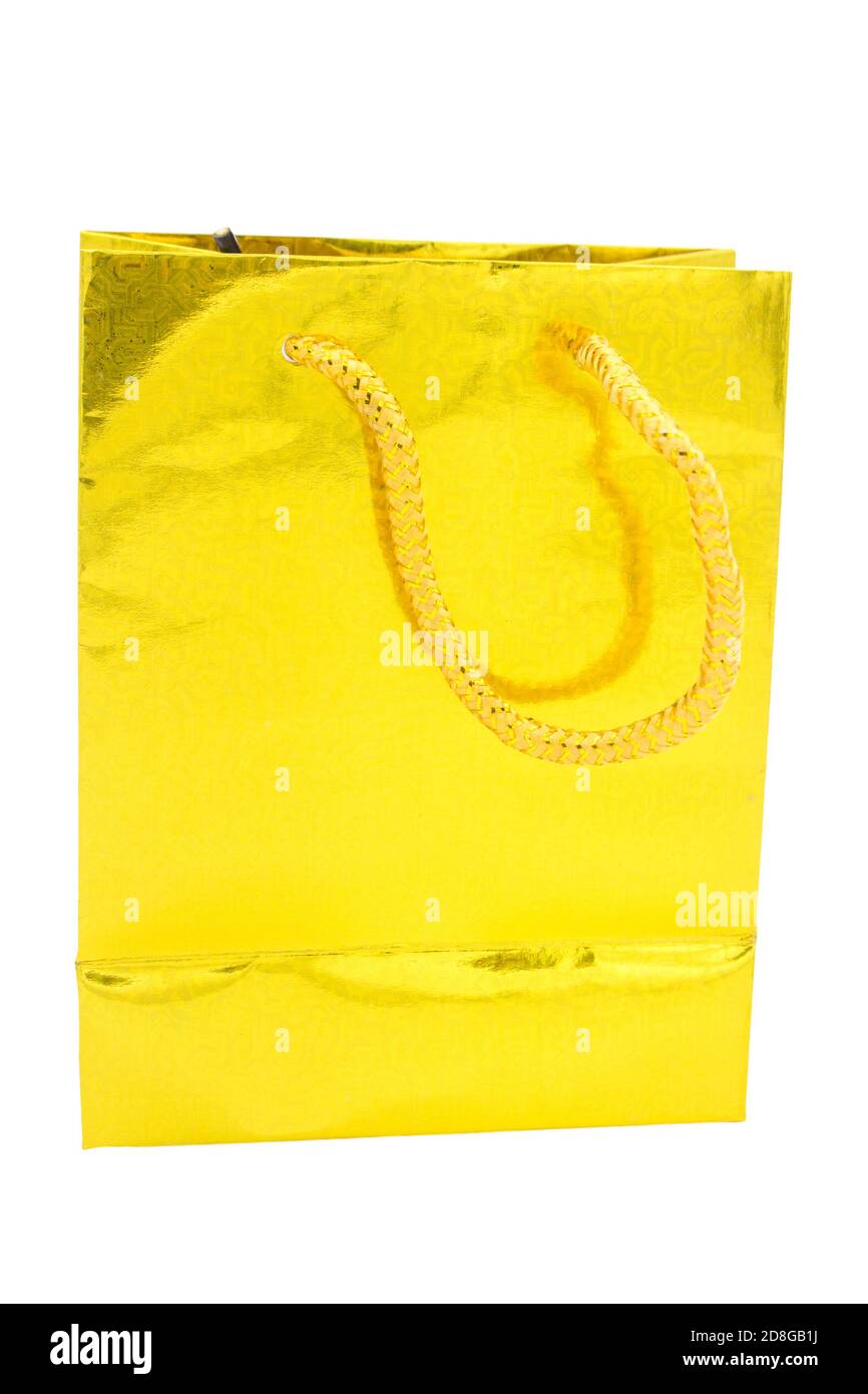 Paper bag yellow gold colored, isolated on white background.Gift ...