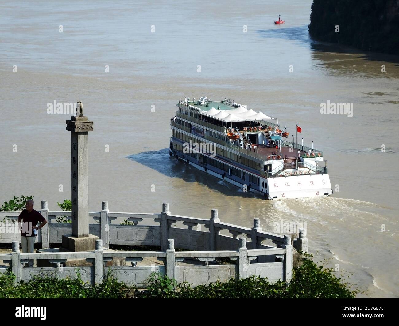 An aerial view of a ship cruising through Xiling Gorge, the largest and ...