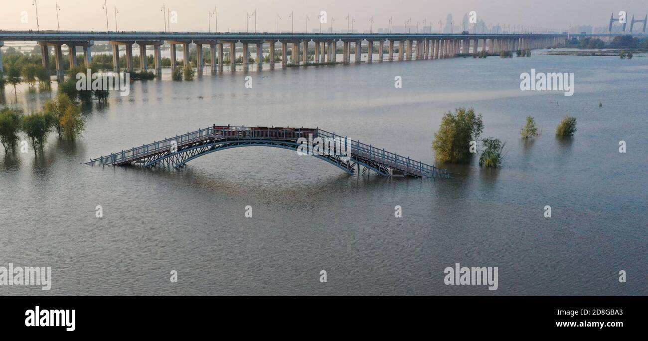 Aerial view of the river banks submerged by rising water of Songhua ...