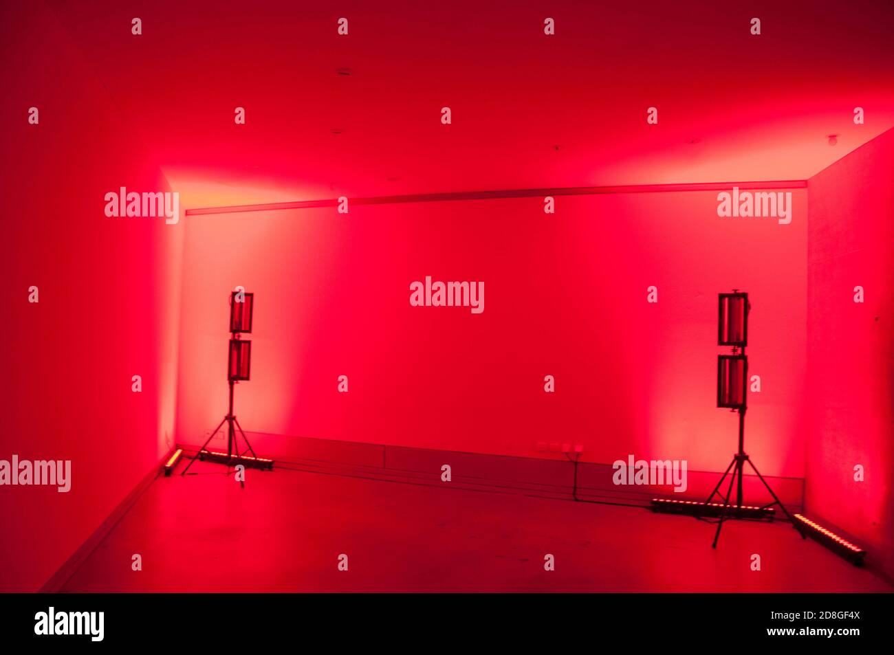 Studio interior with red lighting Stock Photo - Alamy