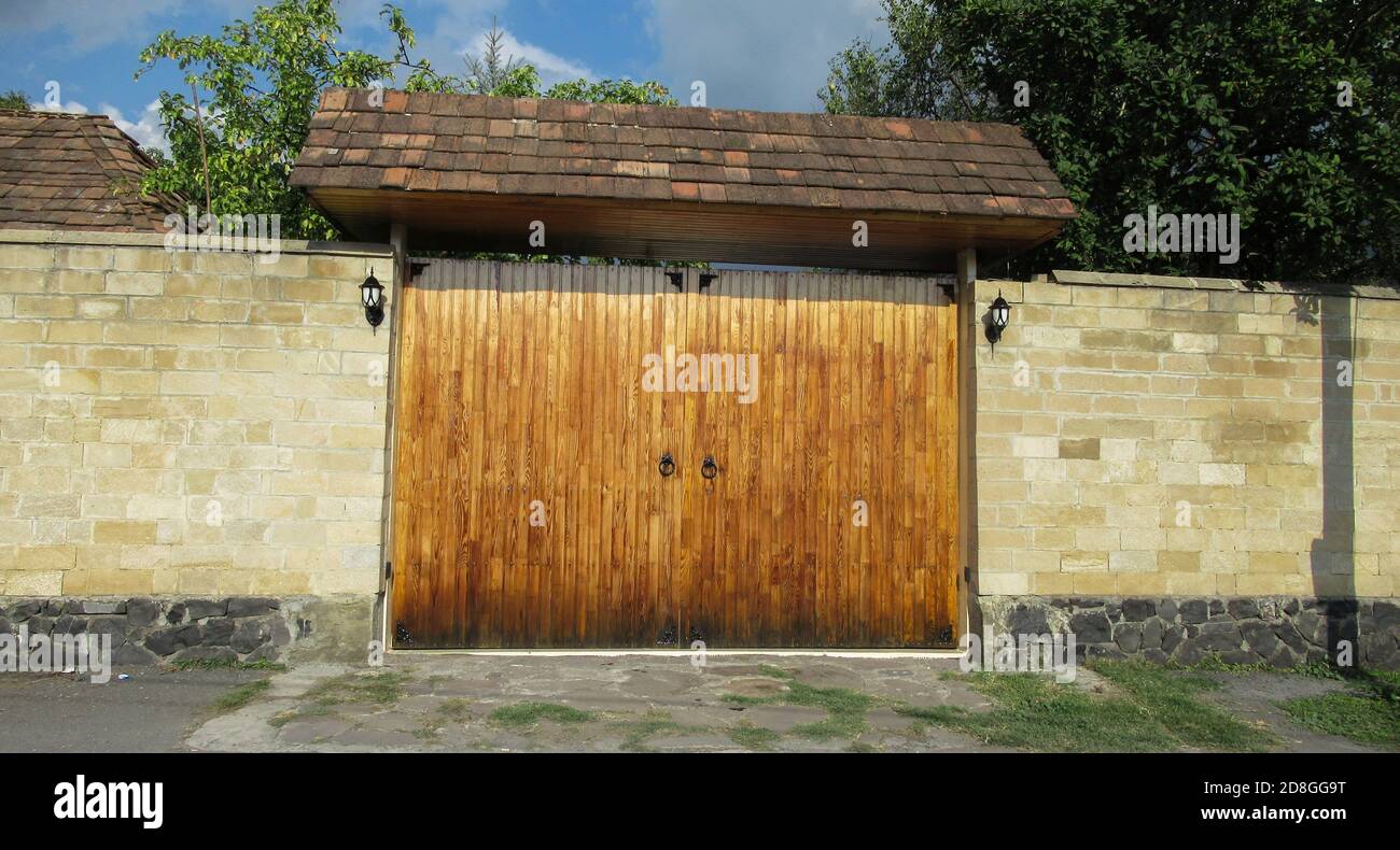 Historical caucasian wooden gate in a rural village Stock Photo - Alamy