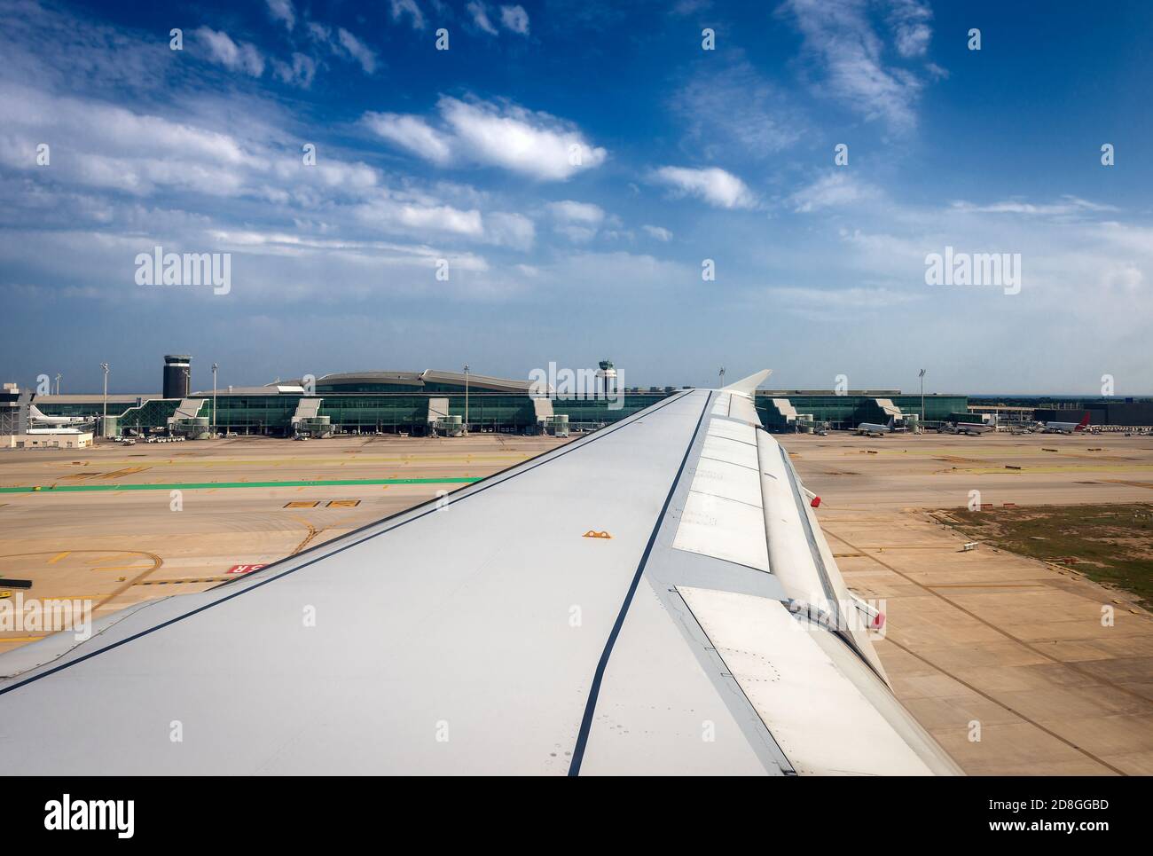 Barcelona-El Prat international Airport seen through the airplane ...