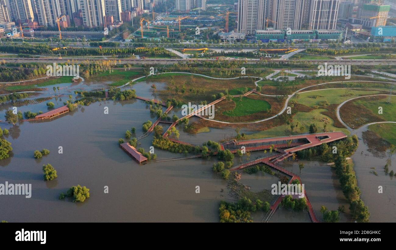 Aerial view of the river banks submerged by rising water of Songhua ...