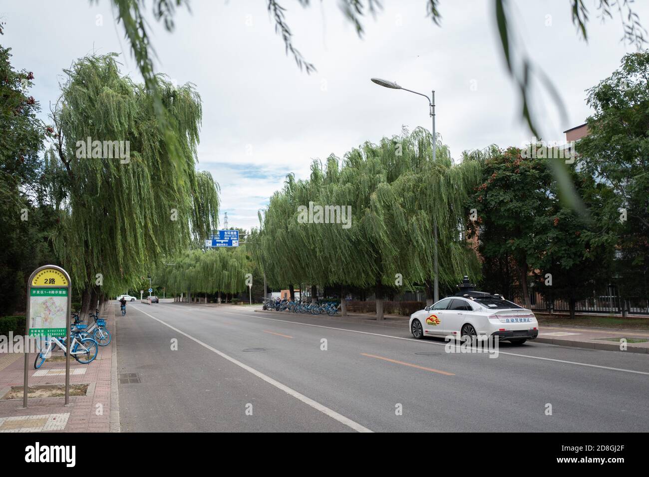 An Apollo Go Robotaxi drives on a road in Beijing, China, 10 September ...