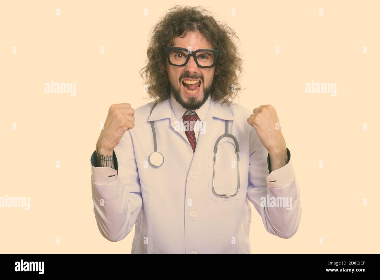 Excited smiling male doctor hi-res stock photography and images - Alamy