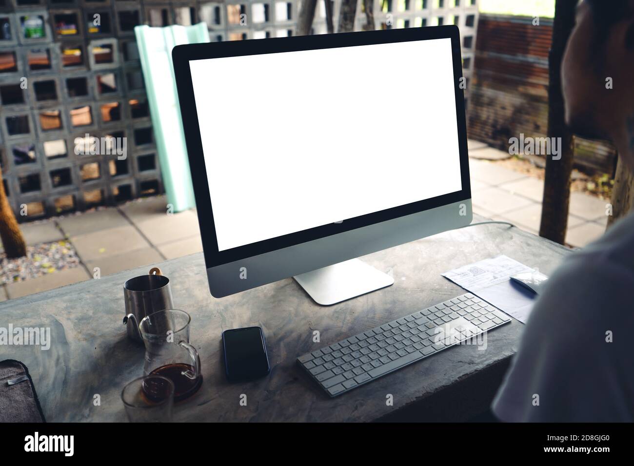 The computer on the table in the house White screen Stock Photo - Alamy