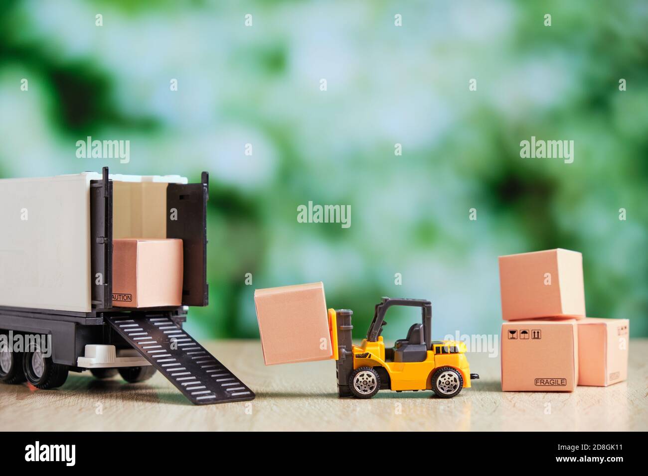 The concept of loading a truck with goods in a container with a ...
