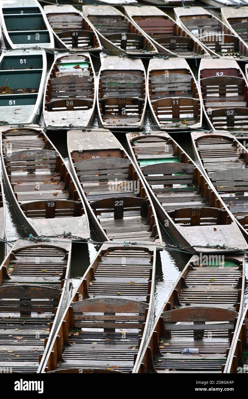 Punts on River Cherwell tied up for the winter by Magdalen Bridge ...