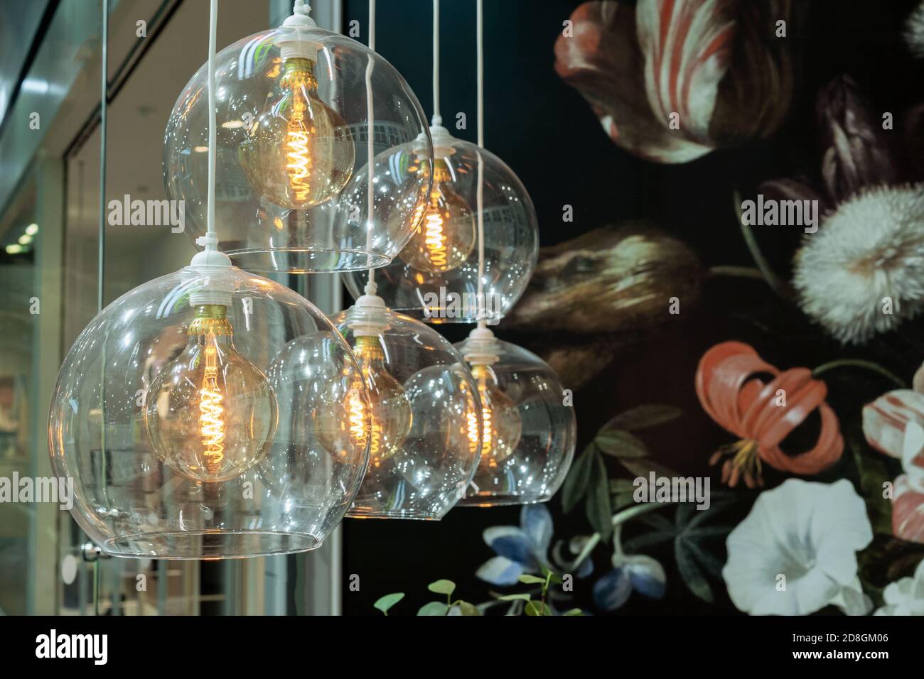 Luminaires with transparent shades and dark glass light bulbs Stock ...