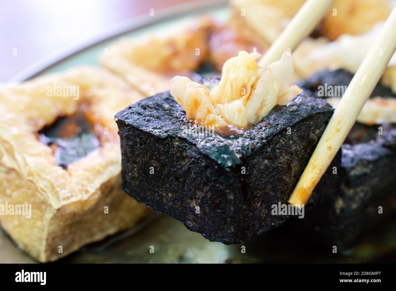 Deep fried stinky tofu, fermented bean curd with pickled cabbage ...