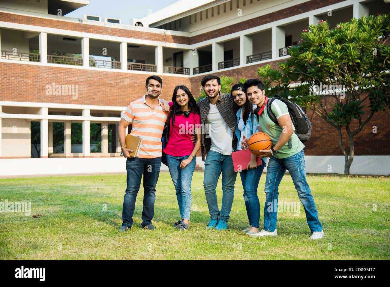 Cheerful Indian asian young group of college students or friends ...