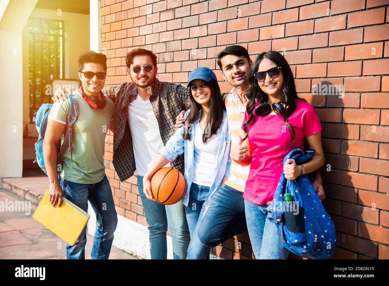 Cheerful Indian asian young group of college students or friends ...