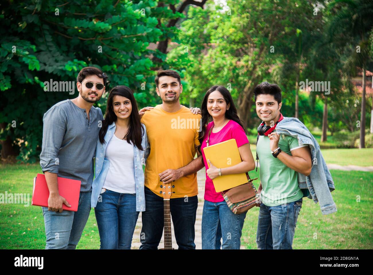 Cheerful Indian asian young group of college students or friends ... Cheerful Indian asian young group of college students or friends ...