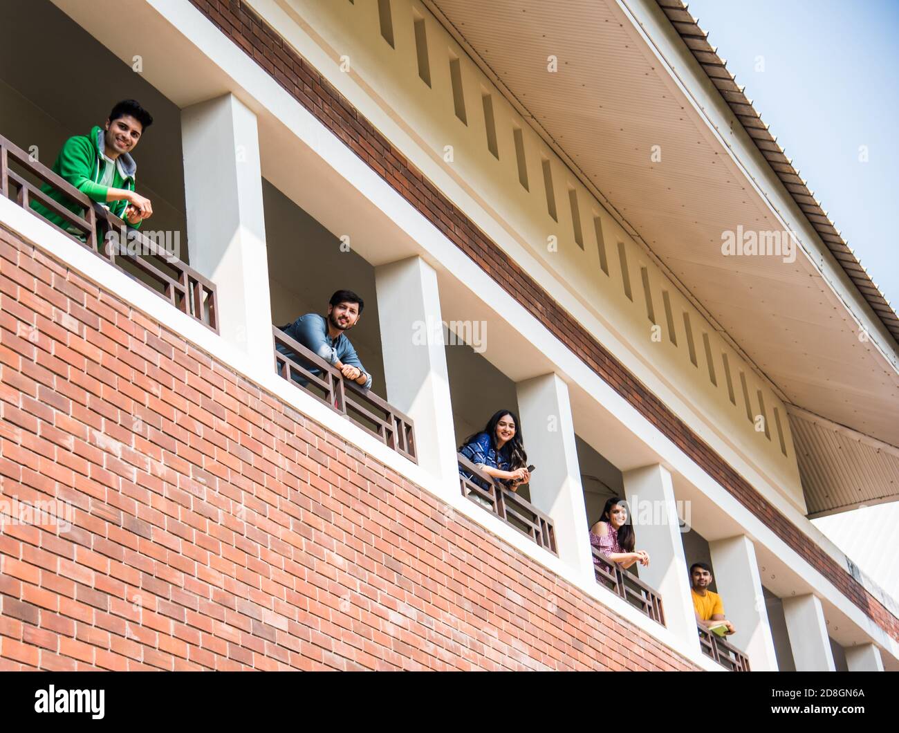 Cheerful Indian asian young group of college students or friends ...