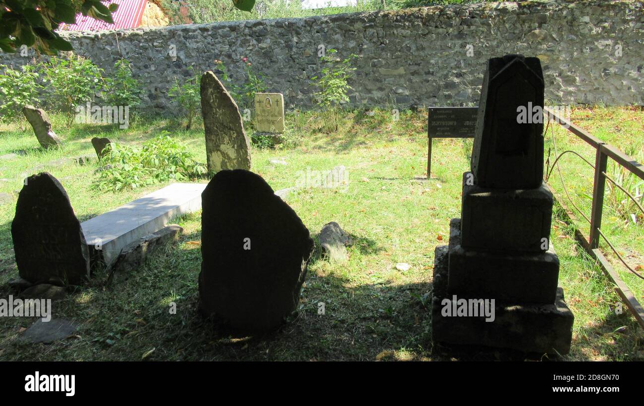 Old Georgian orthodox cemetery, gravestones with old georgian writings ...