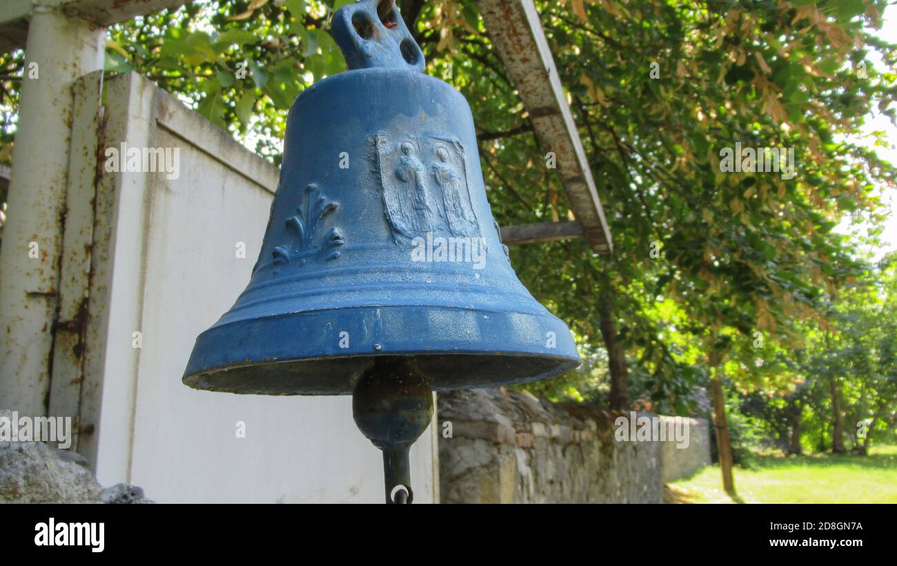 A orthodox christian church bell in front of the church building ...