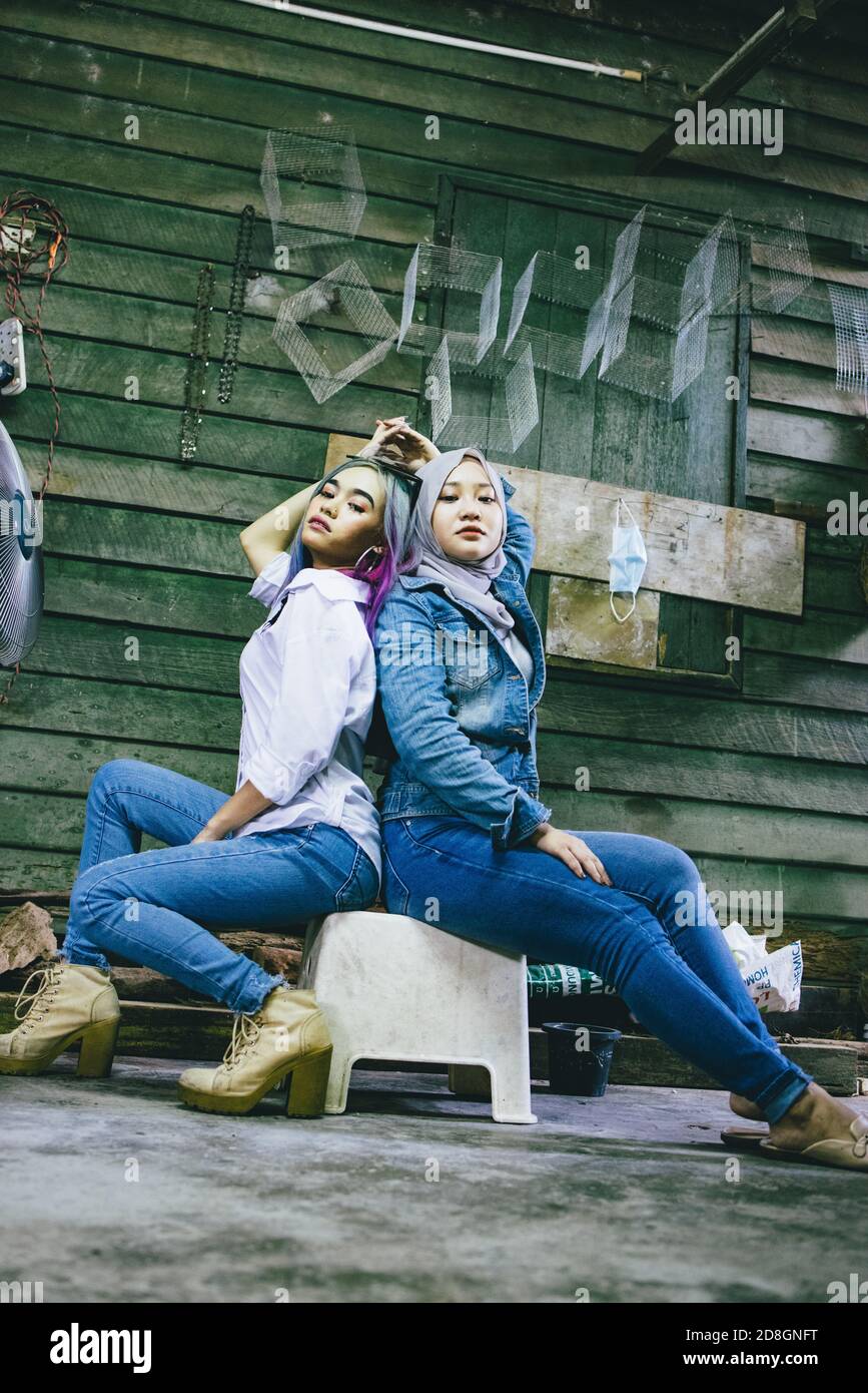 Two beautiful models at photoshoot posing Stock Photo - Alamy