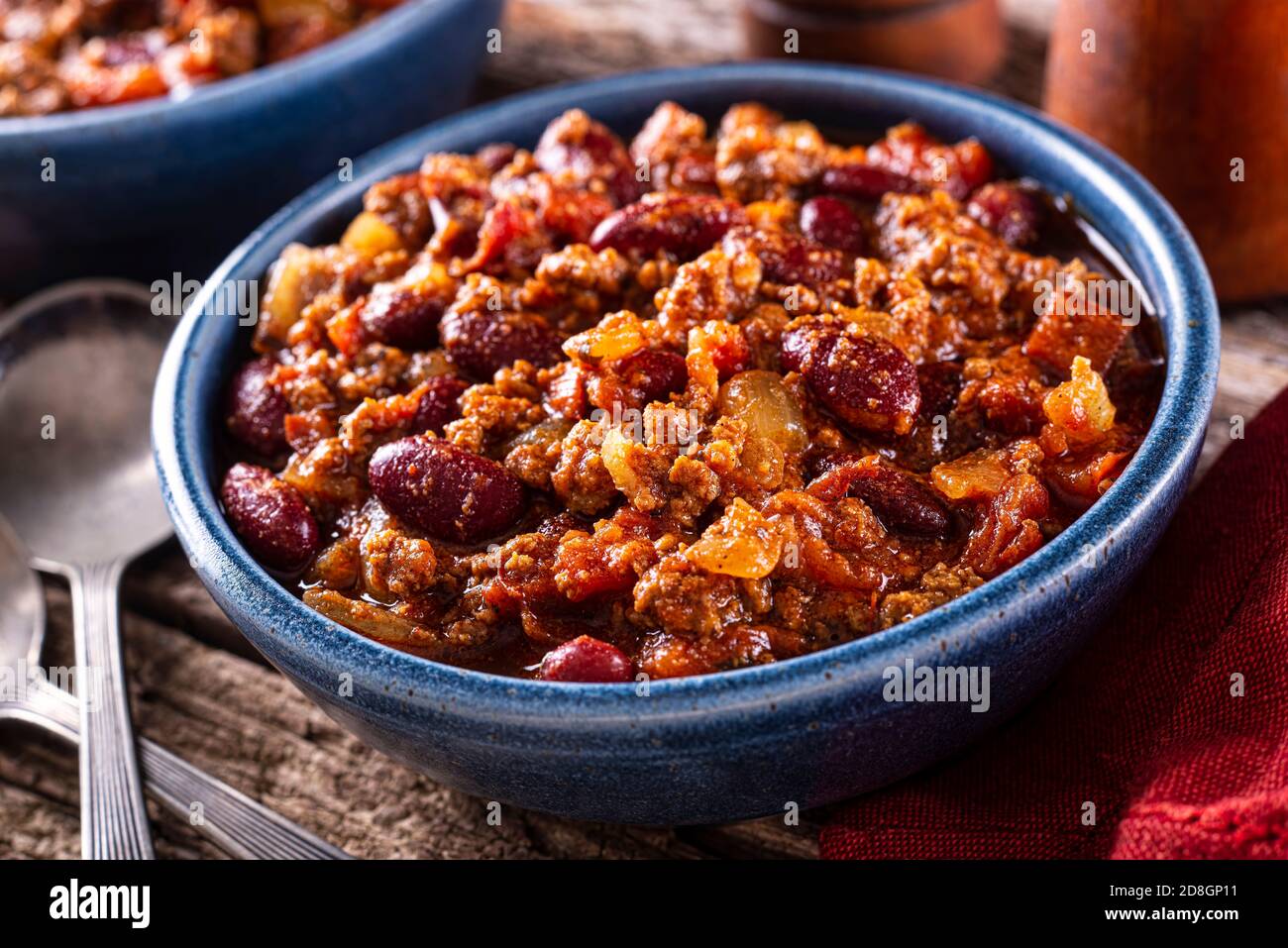 A bowl of delicious spicy hot chili con carne with ground beef, onion ...