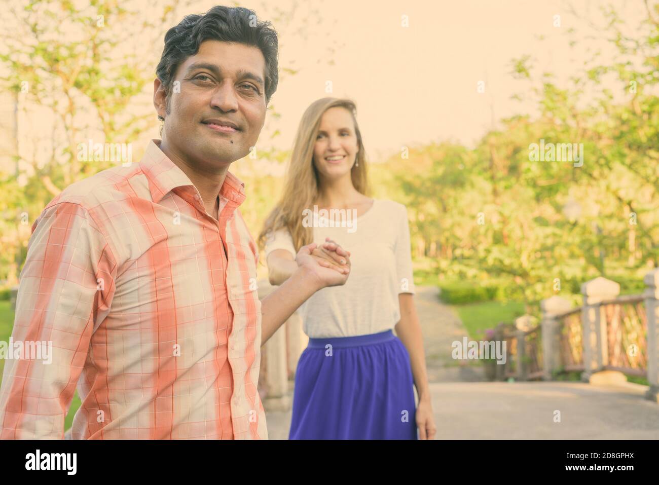 Indian couple holding hands hi-res stock photography and images - Alamy