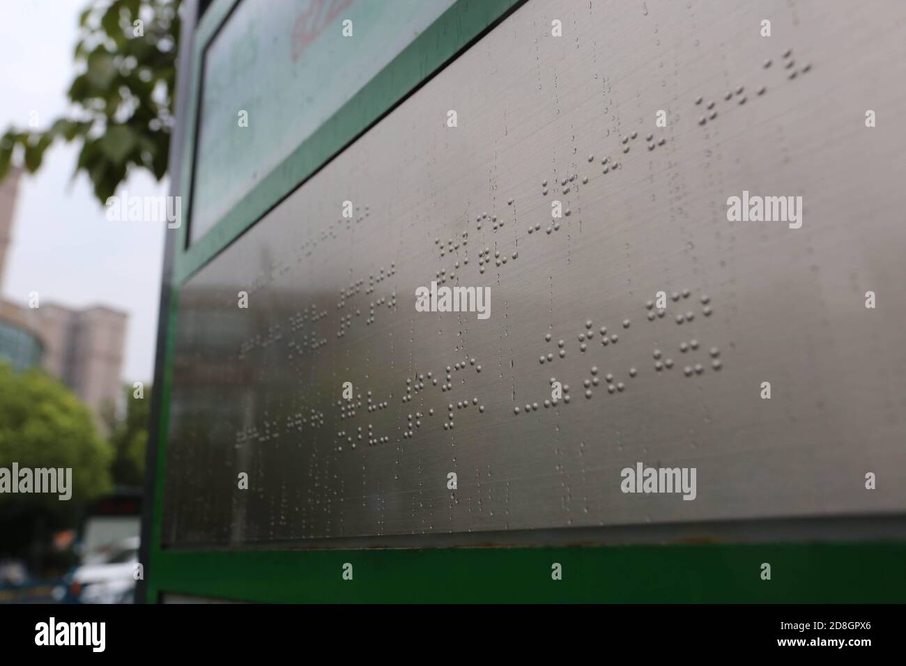 The first tactile and braille signages are installed at 92 bus stops in ...