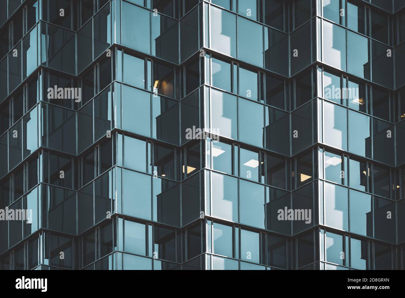 Geometric glazed facade of an office building Stock Photo - Alamy