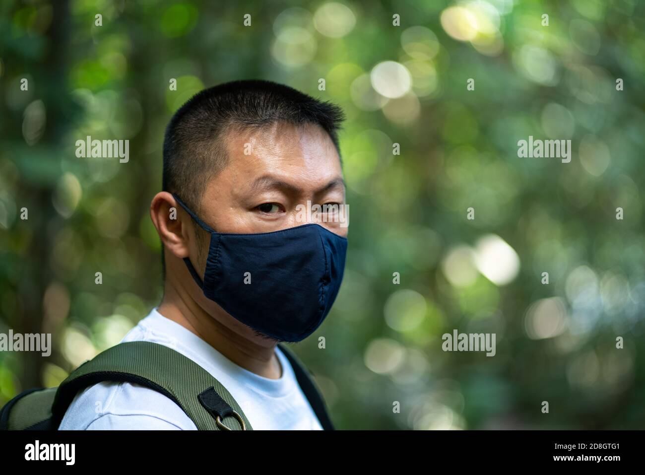 Chinese asian man wearing face mask Stock Photo - Alamy
