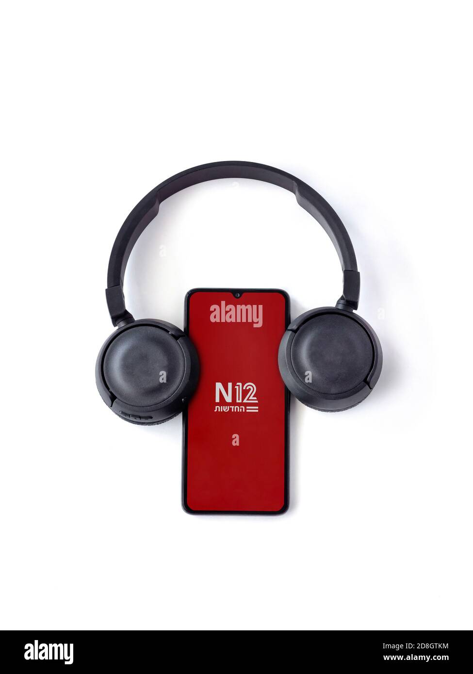 Lod, Israel - July 8, 2020: Black mobile smartphone with N12 app launch ...