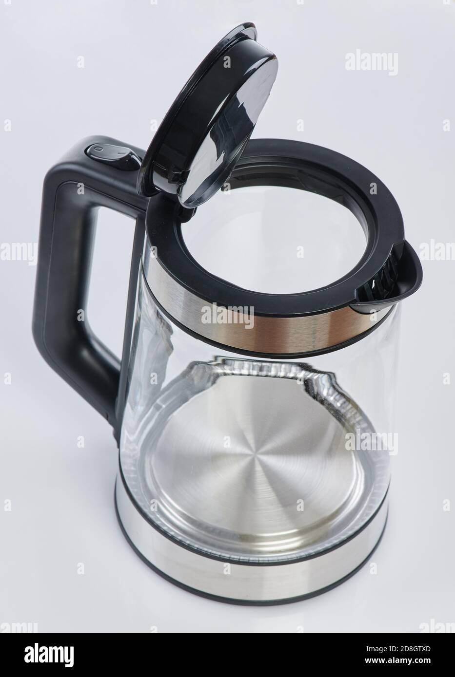 Open transparent kettle isolated on white studio background top view ...