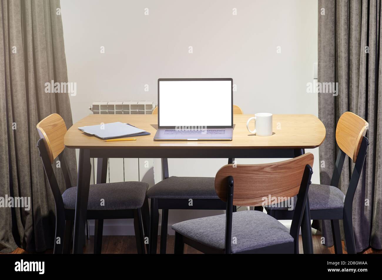 Open laptop on wooden desk table indoor. Working from home Stock Photo ...