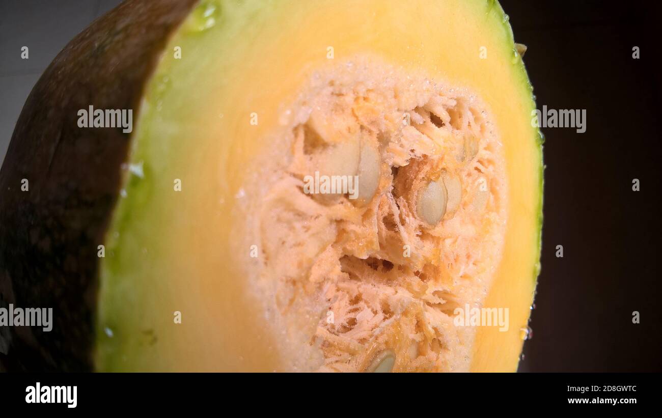 closeup of cross section view of raw vegetable pumpkin a cultivar of ...
