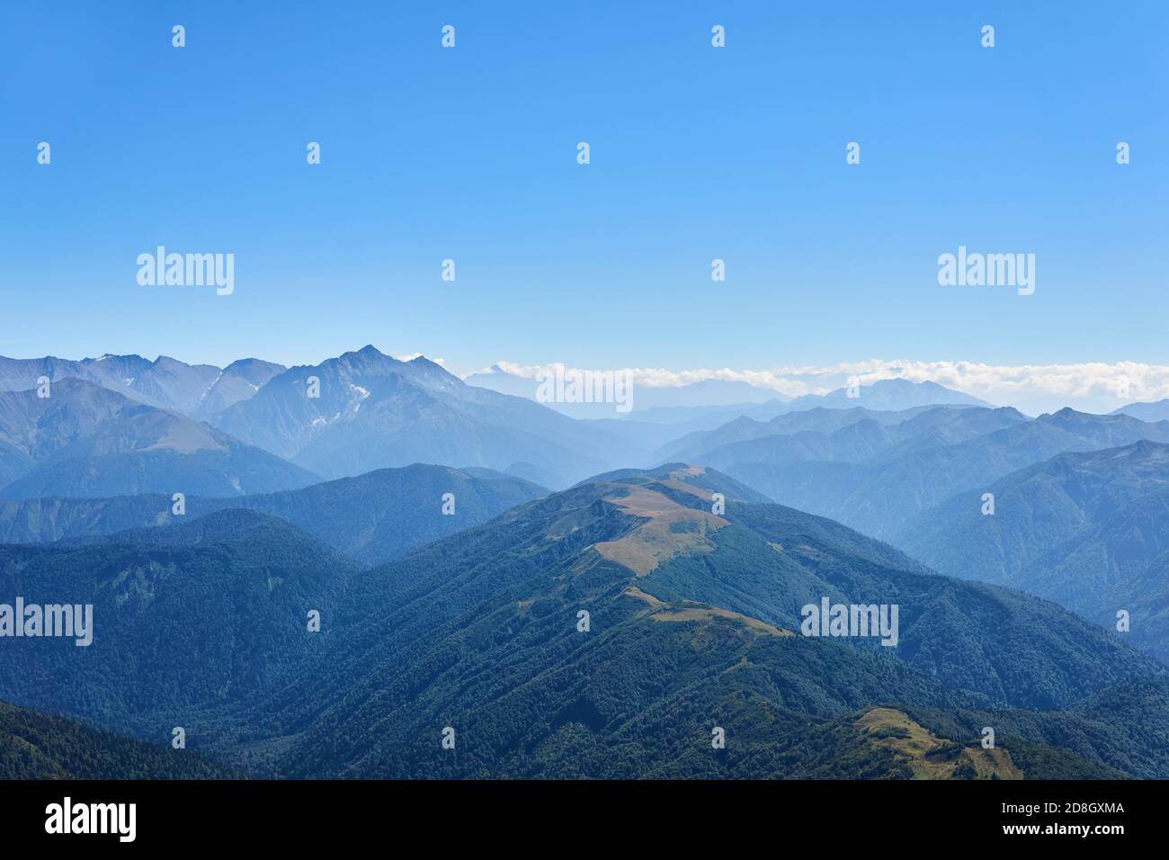 view from the top of Mount Oshten to the distant ranges of the Caucasus ...