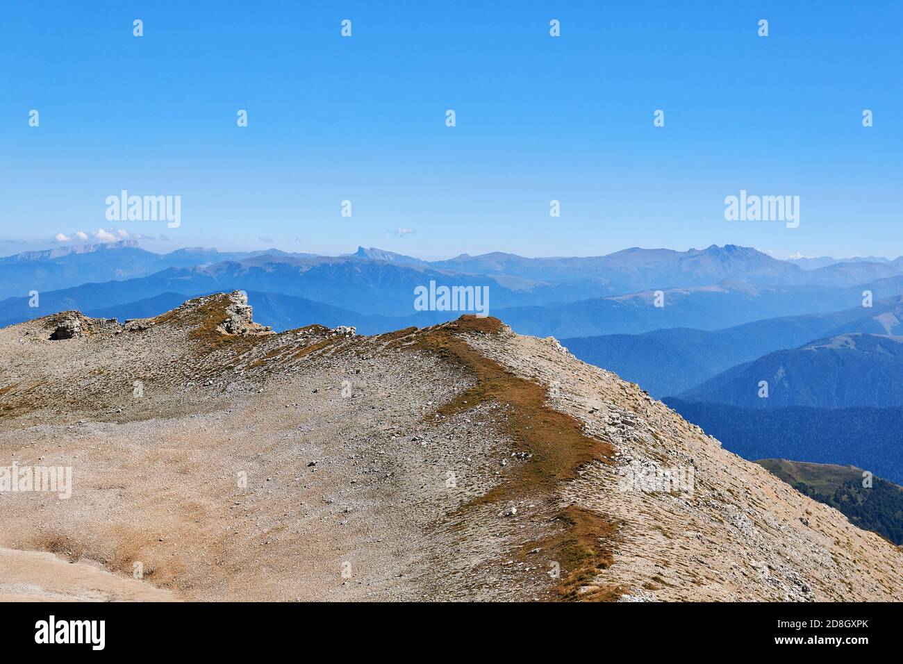 sheer cliffs along the summit ridge of Mount Oshten in the western ...