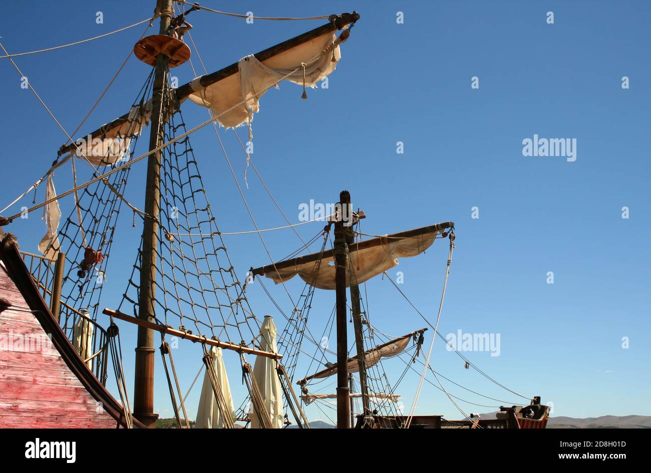 Low angle shot of ragged sails on a pirate ship during daylight Stock ...