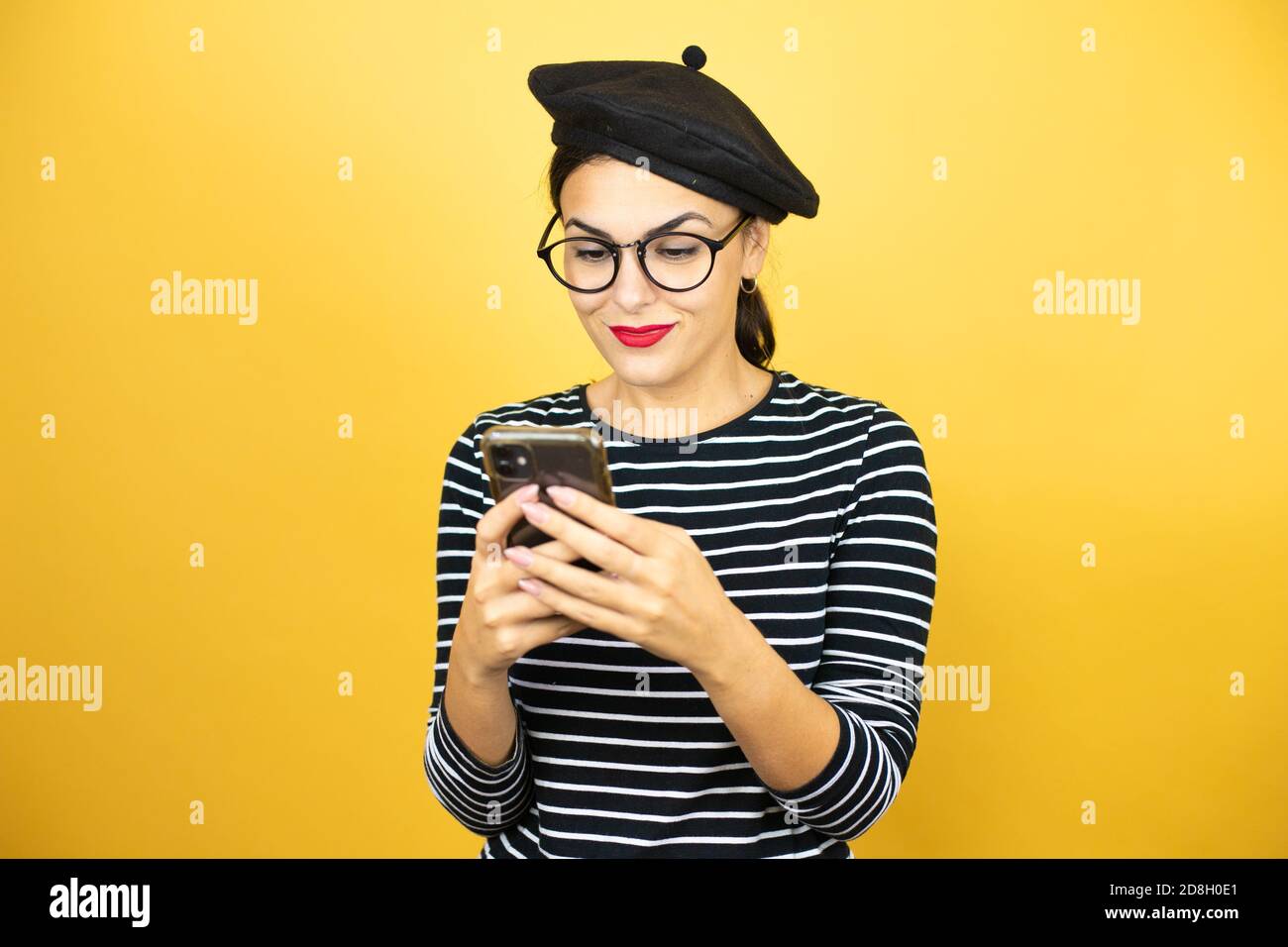 Woman beret stripes hi-res stock photography and images - Alamy