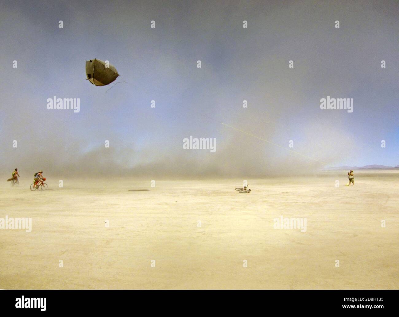 A tent flying in the desert in a dust storm Stock Photo - Alamy