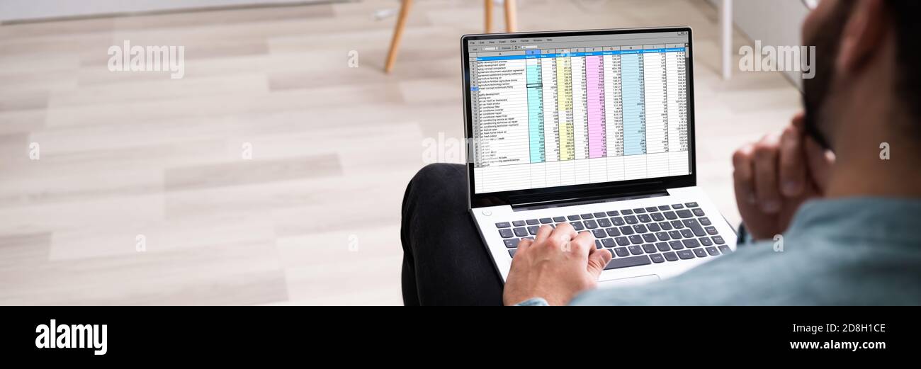 Analyst Employee Using Spreadsheet On Computer Screen Stock Photo - Alamy