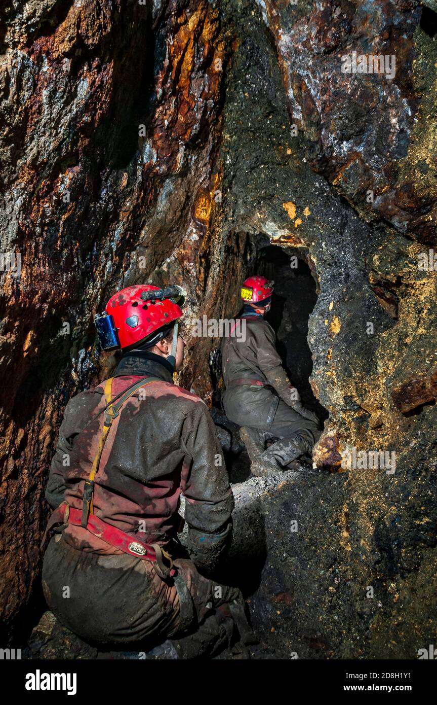 Faulted passage, with one vein wall limestone and the other wall and ...