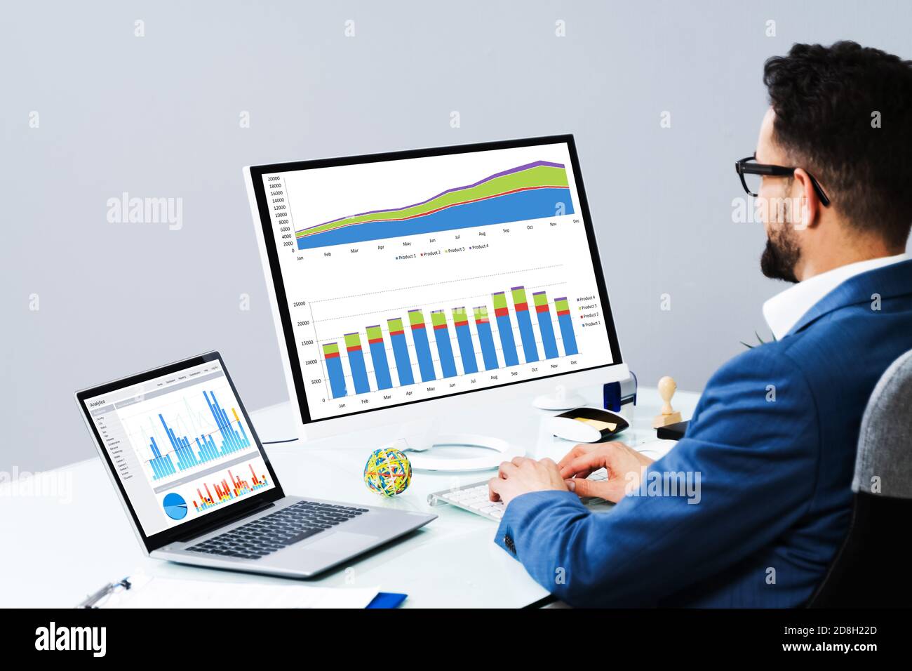 Business Data Analyst Using Computer For Financial Research Stock Photo ...