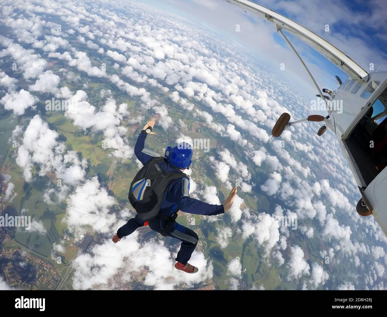 Skydiving caucasian man Stock Photo - Alamy